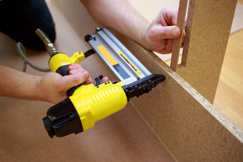 Man Working with Pneumatic Stapler Stock Image - Image of staple ...