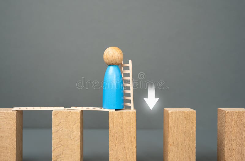 A Man Makes His Way through the Cliffs with Ladders. Stock Image ...