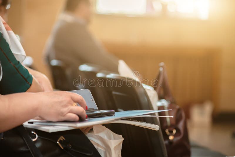 Man Makes Notes in a Notebook while Sitting at a Press Conference Stock ...