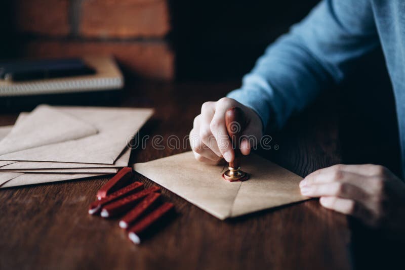 Man Makes the Stamp Using Sealing Wax on the Envelope Stock Image ...