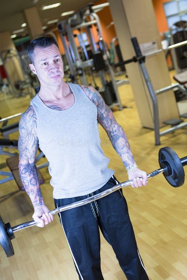 Man Making Bar Curl - Workout Routine Stock Image - Image of muscular ...