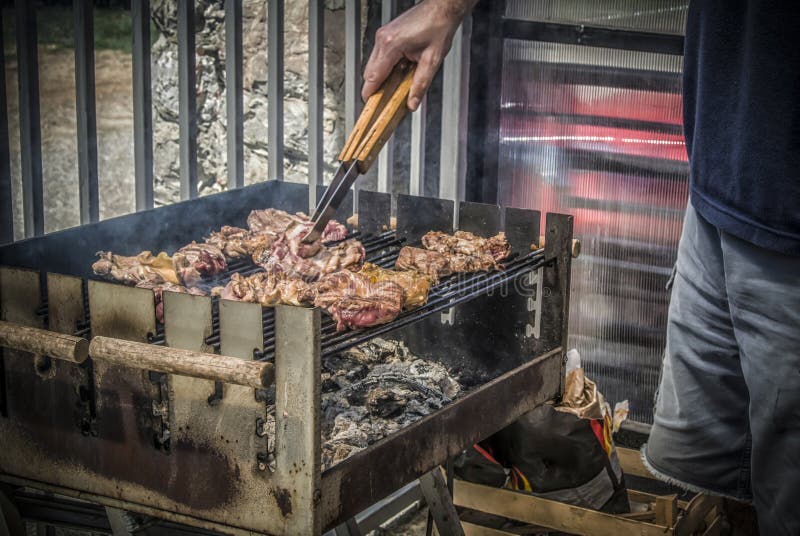 A man making barbecue stock photo. Image of barbecue - 109587404