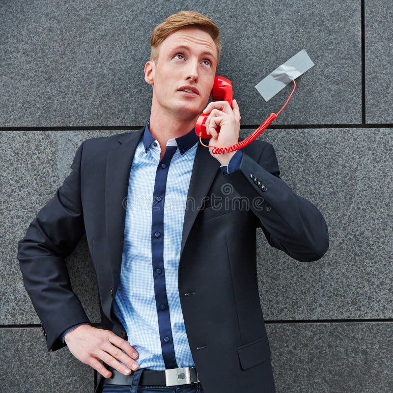 Man Making Call with Phone Taped To Wall Stock Image - Image of phone ...