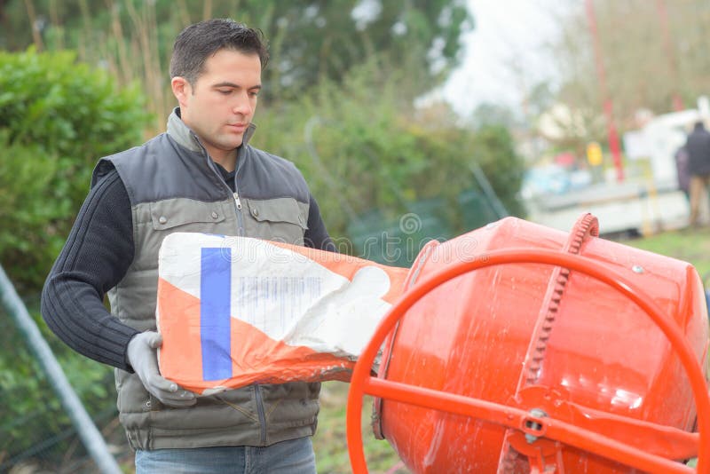 Man Making Cement with Concrete Machine Stock Image - Image of making ...