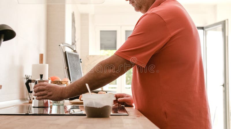 Man Making Coffee at Home in the Morning Stock Photo - Image of ...