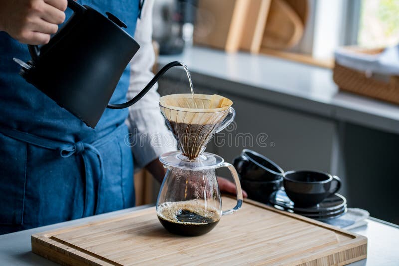 Man Making Coffee in the Kitchen. Delicious Coffee Image. Stock Photo ...