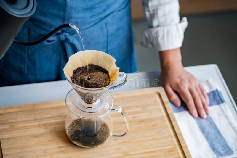 Man Making Coffee in the Kitchen. Delicious Coffee Image. Stock Photo ...