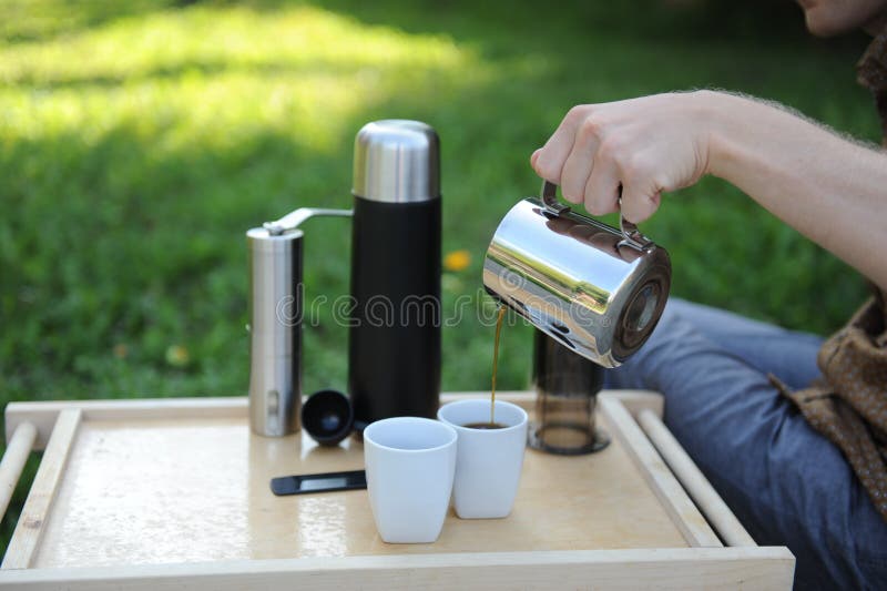 Man Making Coffee in Nature Stock Photo - Image of cooking, mature ...