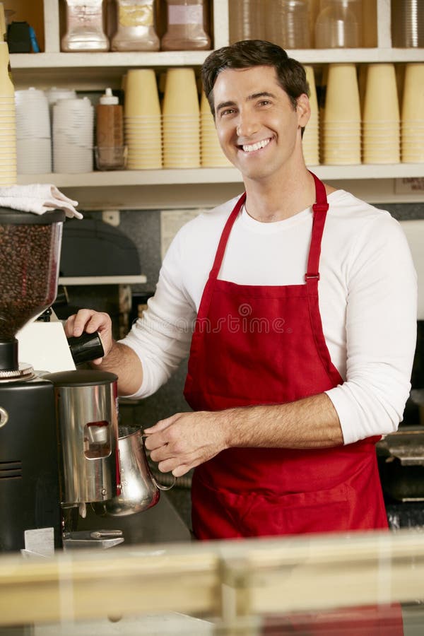 Man Making Coffee in Cafe stock photo. Image of making - 16053254