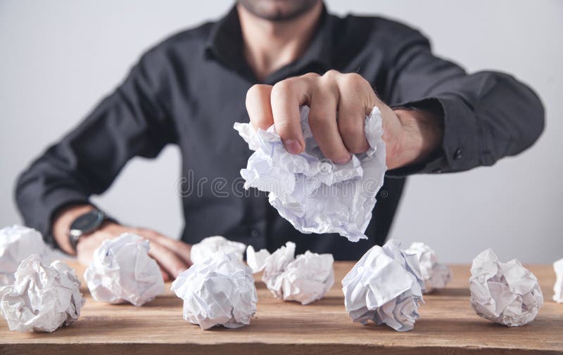 Man Making Crumpled Paper Balls on the Table Stock Photo - Image of ...