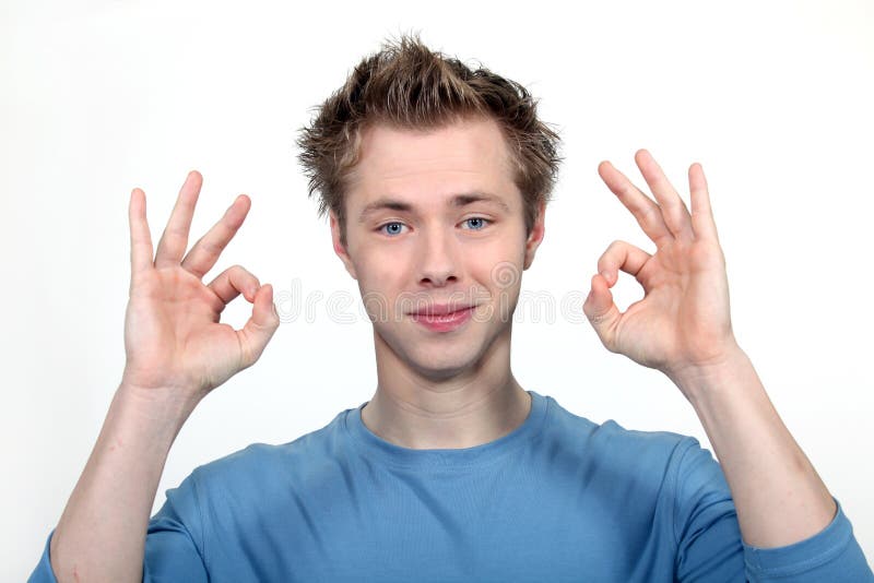 Man making double OK sign stock image. Image of young - 28297215