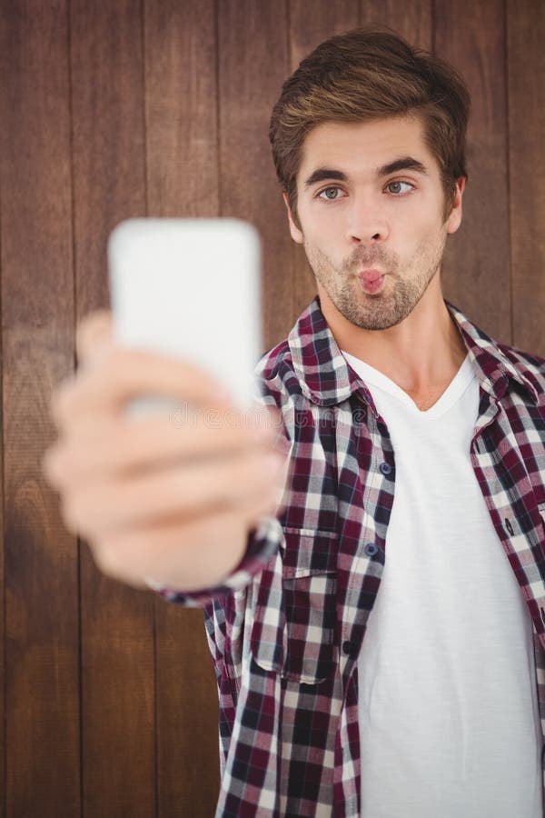 Man Making Face while Taking Selfie Stock Image - Image of casual ...