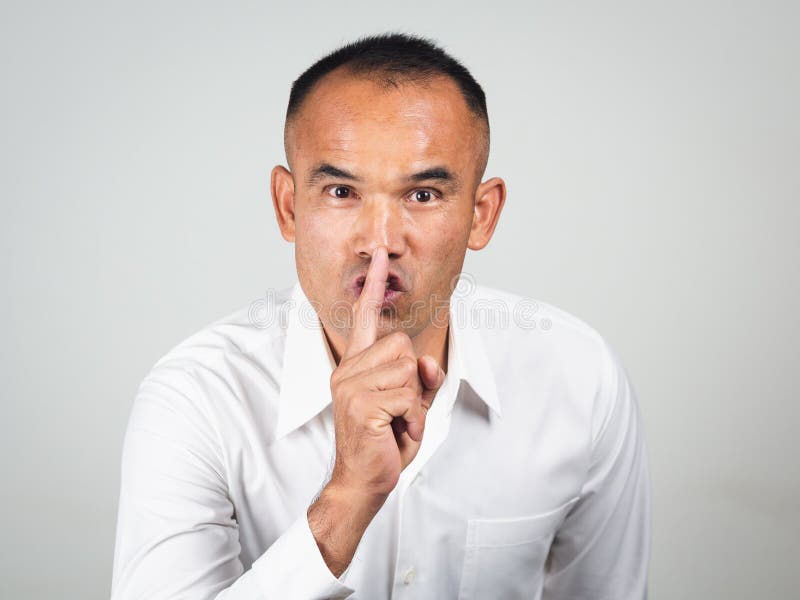 The Man Making Finger on Lips Silence Gesture, Pst, Shh Stock Photo ...