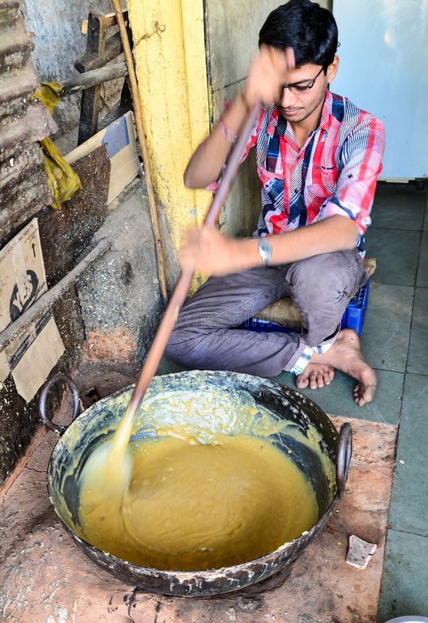 A man preparing halwa puri editorial stock image. Image of culture ...