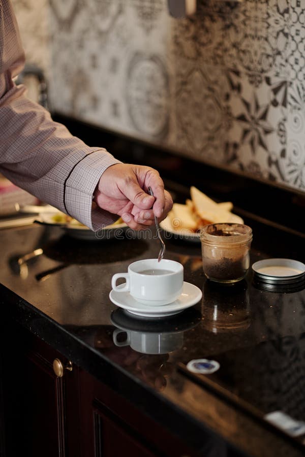 Man Making Instant Coffee stock image. Image of sugar - 263840475