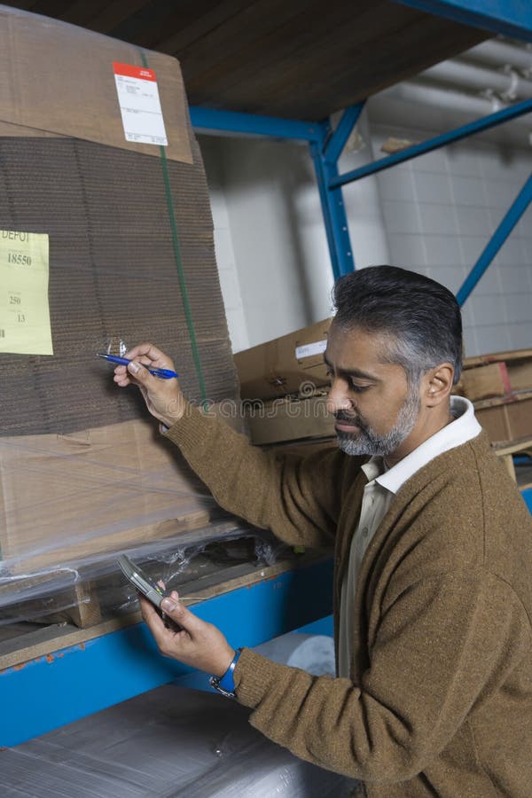 Man Making Inventory in Factory Stock Image - Image of boomer, indoors ...