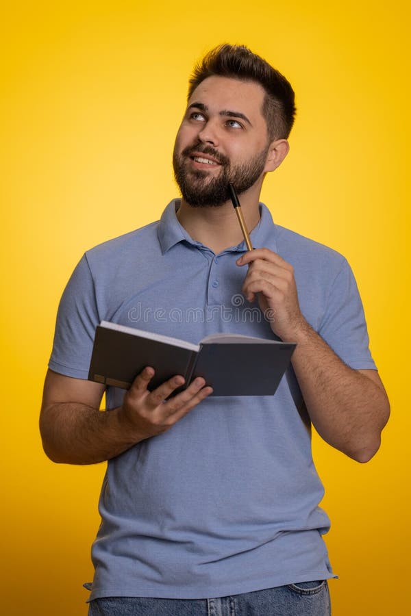 Man Making Notes, Writing Down Thoughts with Pen into Notepad Notebook ...