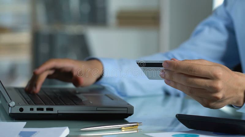 Man Making Online Payment on Computer, Using Card for Internet Banking ...