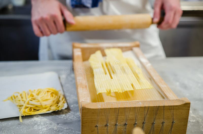 Man Making Pasta Alla Chitarra Stock Image - Image of maccheroni, meal ...