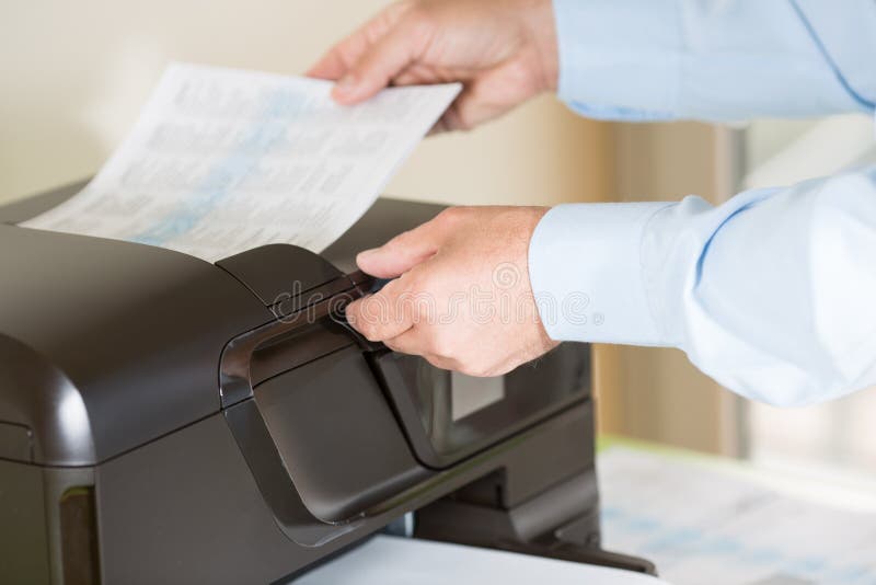 Man making a photocopy stock photo. Image of electronics - 40052744