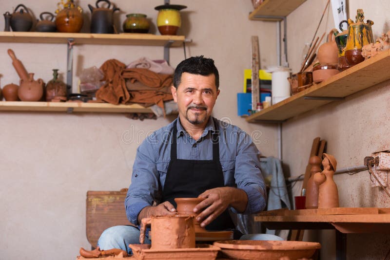 Man making pot stock photo. Image of male, artisan, wheel - 223344838