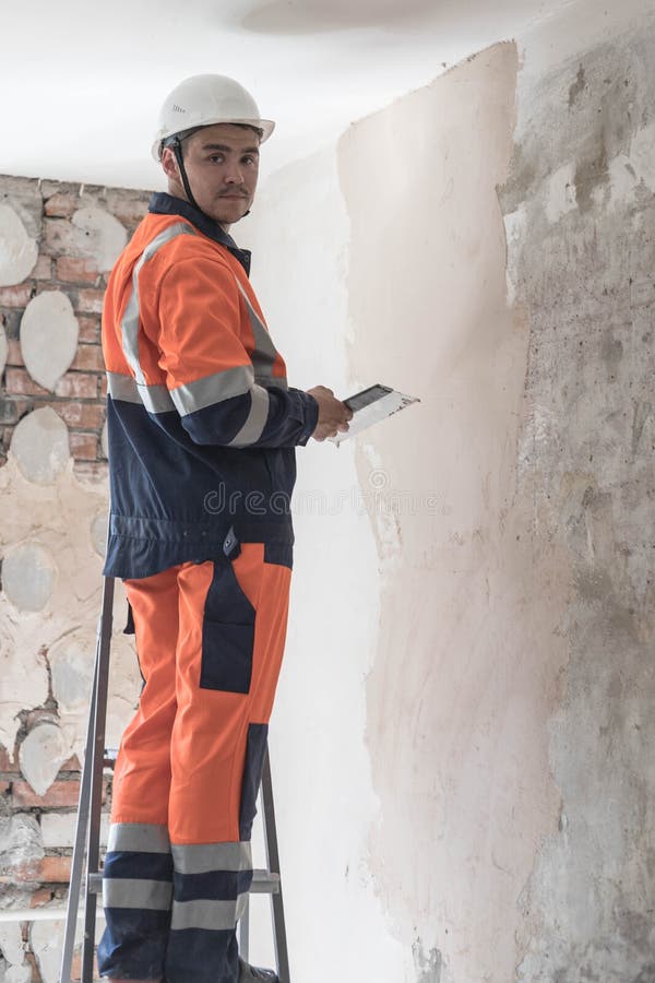 A Man is Making Repairs at Home. Stock Image - Image of contractor ...