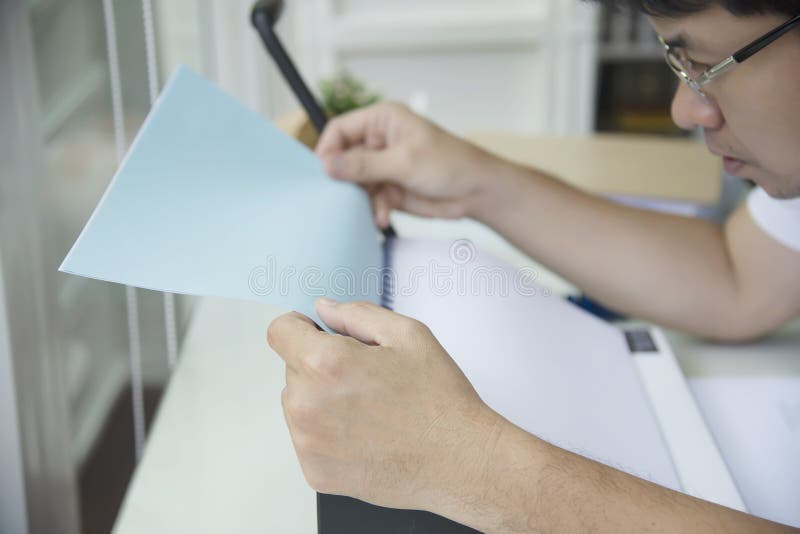 Man Making Report Using Comb Binding Machine Stock Image - Image of ...