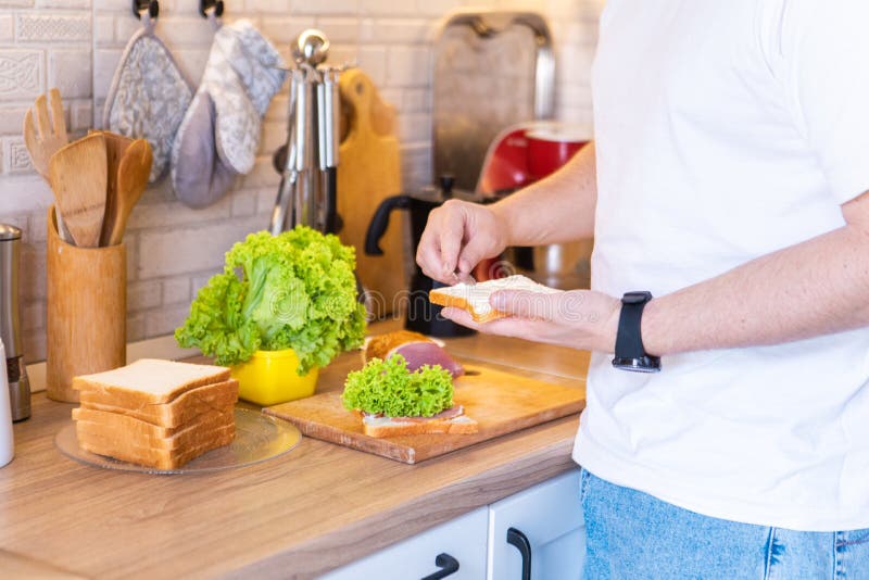 Man Making Sandwich on the Kitchen Stock Image - Image of cook, bread ...