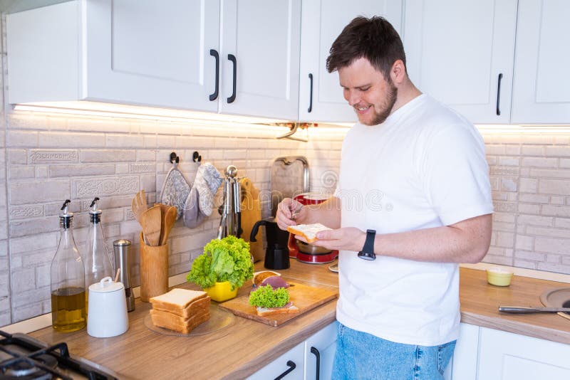 Man Making Sandwich on the Kitchen Stock Image - Image of cooking ...