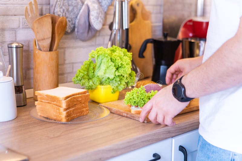 Man Making Sandwich on the Kitchen Stock Image - Image of lettuce ...
