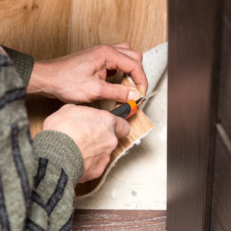 A Man is Making a Threshold on the Floor Stock Image - Image of white ...