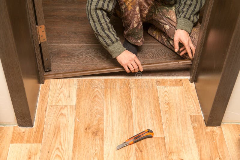 A Man is Making a Threshold on the Floor Stock Photo - Image of empty ...