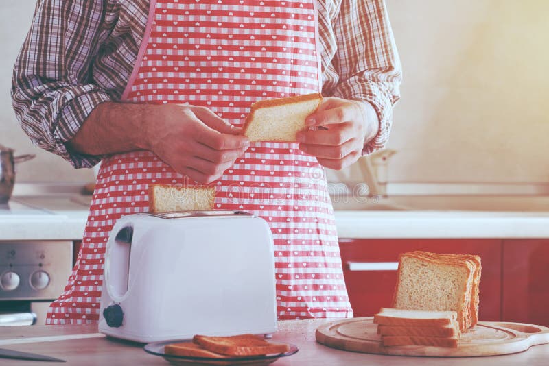Man Making Toasts with Toaster Stock Image - Image of nutrition, crisp ...