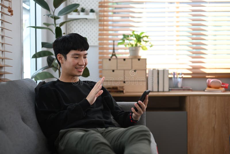 Man Making Video Call, Having Virtual Chat on Smart Phone from Home ...