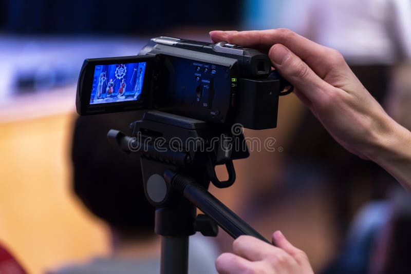 Man Making Video on Video Camera Stock Image - Image of camera ...