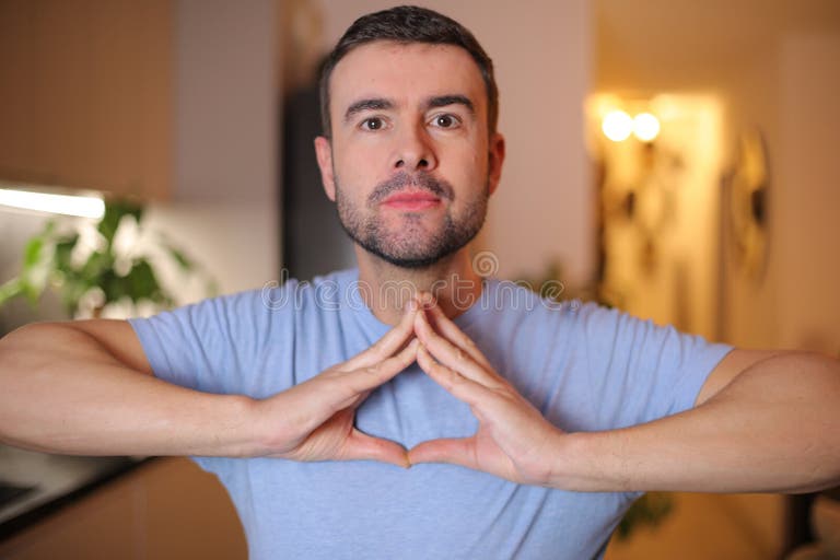 Man Making a Weird Triangular Symbol with His Hands Stock Image - Image ...