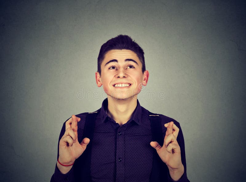 Man Making a Wish Keeping His Fingers Crossed. Stock Image - Image of ...