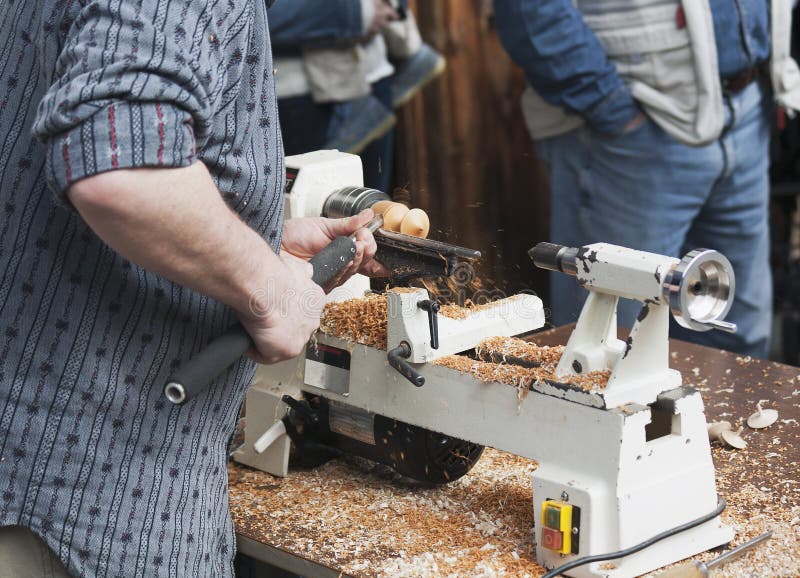 Man making wooden toy stock image. Image of fast, rotating - 25706735