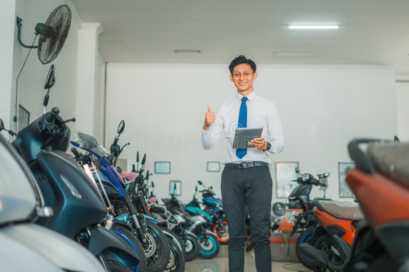 Man Manager in Tie Shows Thumbs Up while Using a Tablet Stock Image ...