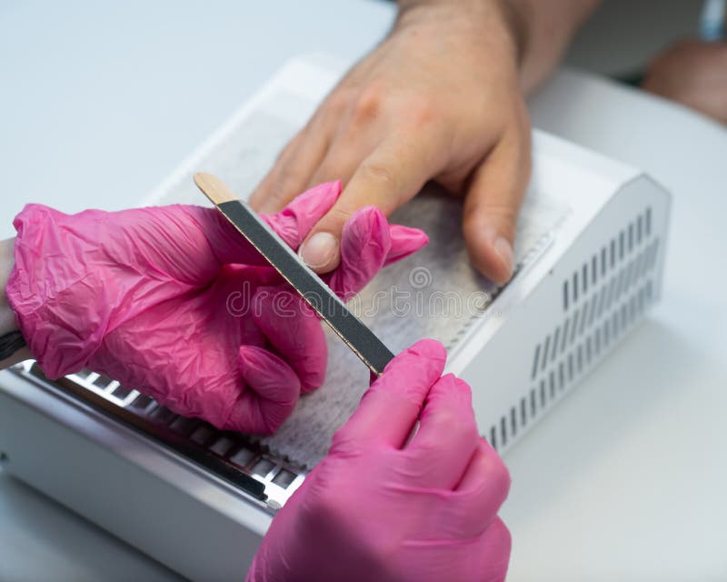 Man on a Manicure Procedure in a Beauty Salon. Stock Image - Image of ...