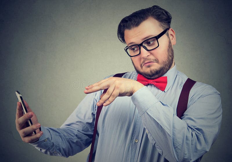 Man Manipulating with Smarpthone and Gesturing Stock Photo - Image of ...