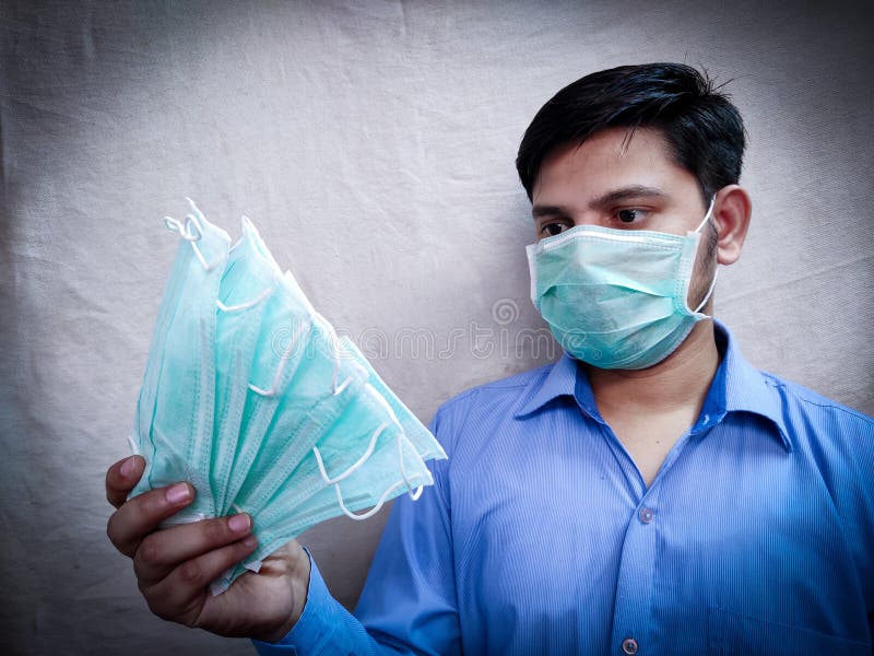 Man in Mask Hold Mask Bunch in Hand Stock Photo - Image of protective ...