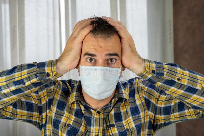 Man with a Mask Scared because of the Covid-19 Stock Image - Image of ...