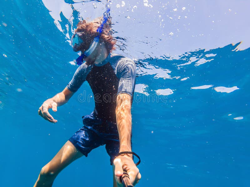 Man with Mask Snorkeling in Clear Water Stock Image - Image of peek ...