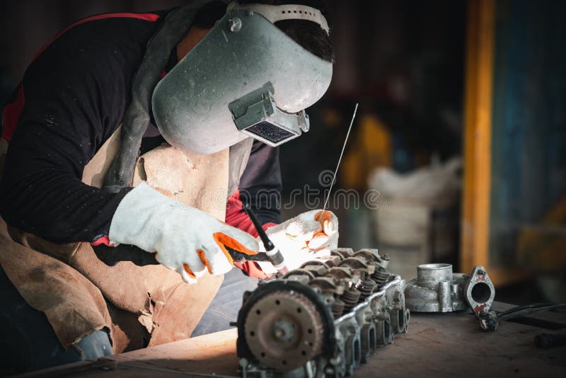 The Man in the Mask is Welding Metal with Argon-arc Stock Image - Image ...