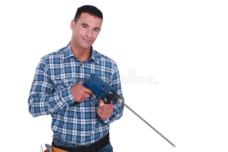 Man with a masonry drill stock image. Image of person - 36145051