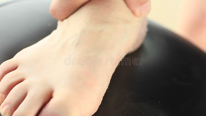 Man Rubbing the Top of His Foot Stock Video - Video of rubbing, toes ...