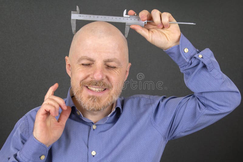 Man Measures the Size of His Nose Measuring Device Caliper Stock Image ...