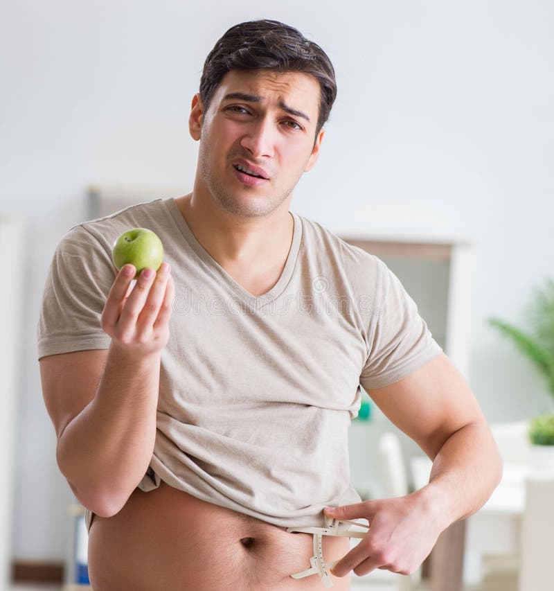 Man Measuring Body Fat with Calipers Stock Photo - Image of holding ...
