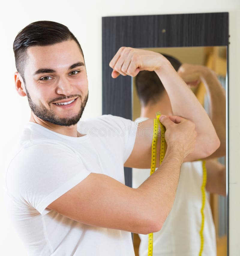 Man Measuring His Bicep and Body Stock Image - Image of measure, flat ...